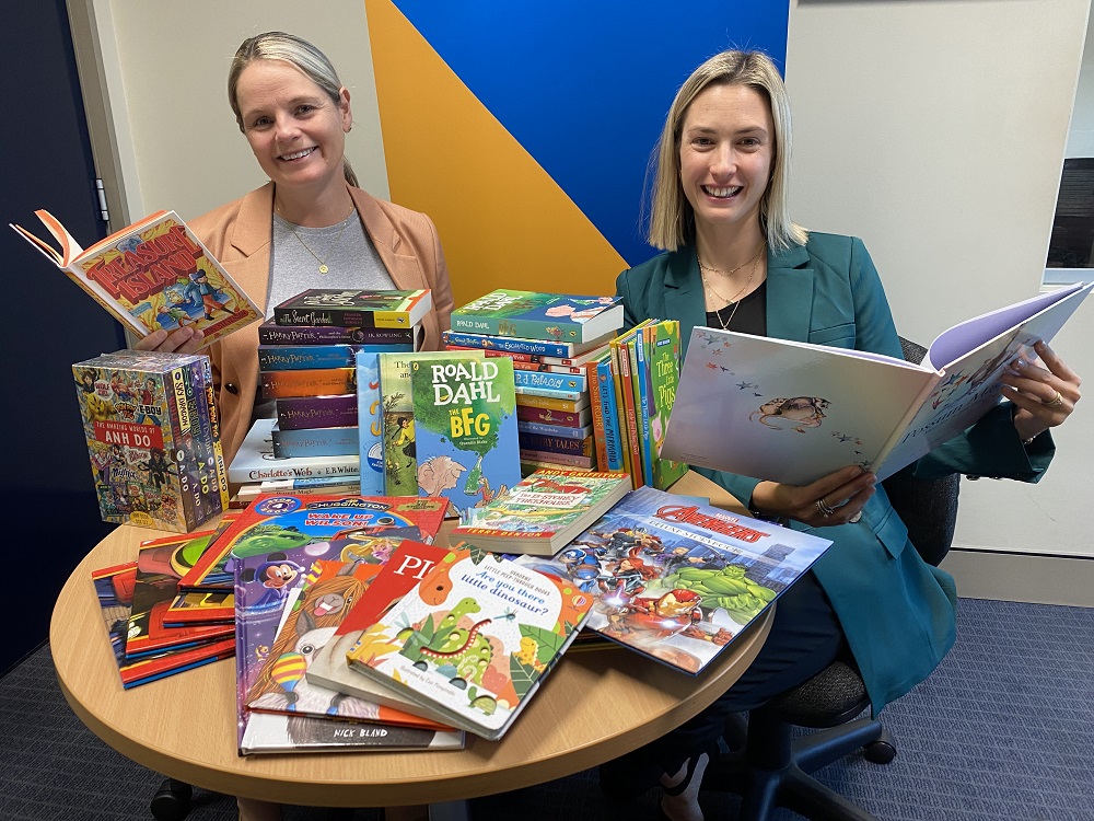 Employees dig deep to share the gift of reading | Newcastle Weekly