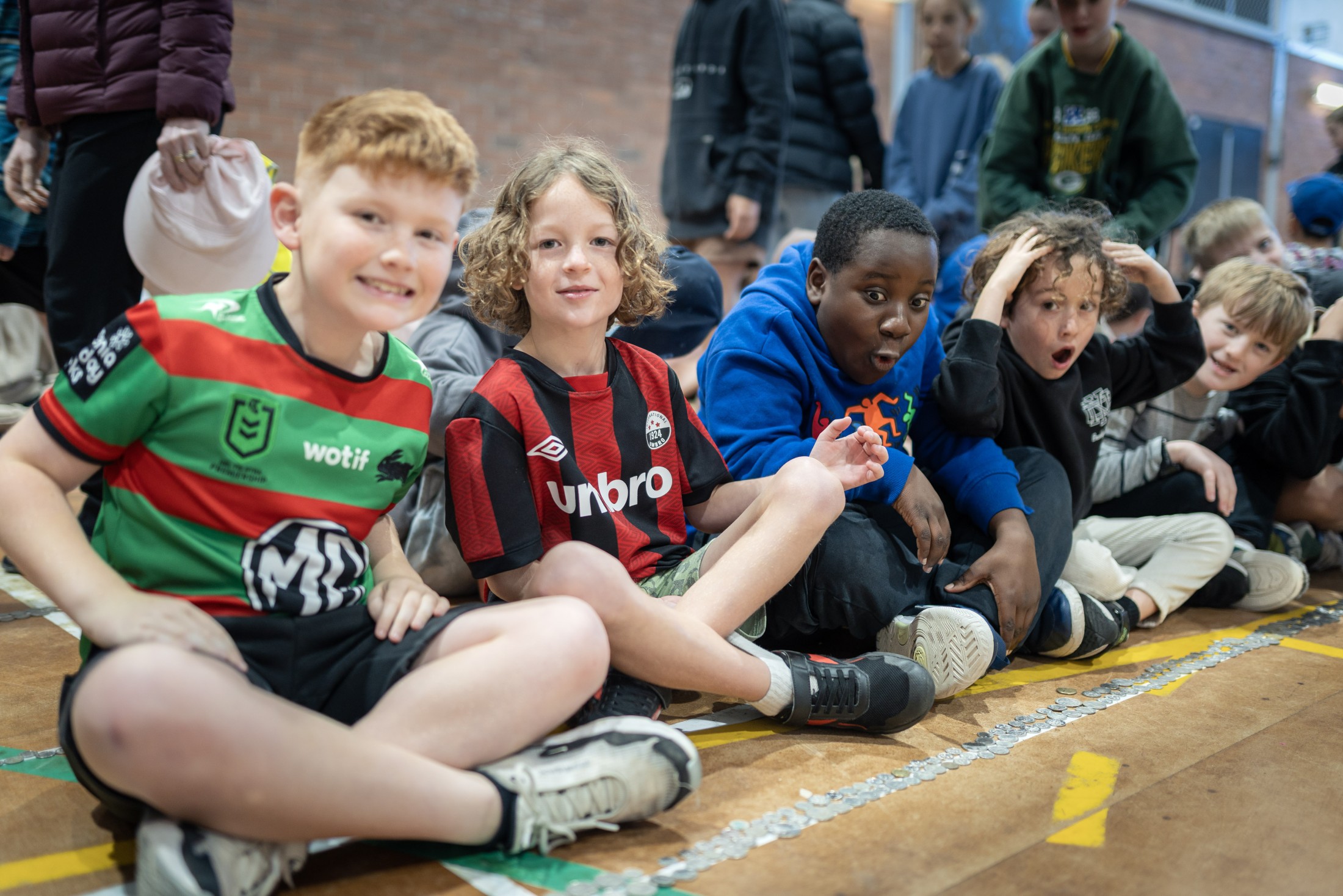 GALLERY: Belmont students line up thousands of coins to support charity ...
